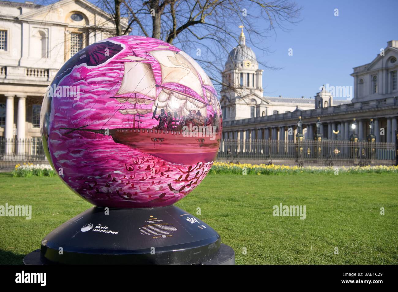 A spherical globe from the artwork the World Reimagined in front of the ...