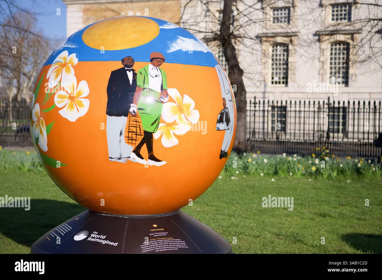 A spherical globe from the artwork the World Re-imagined in front of ...