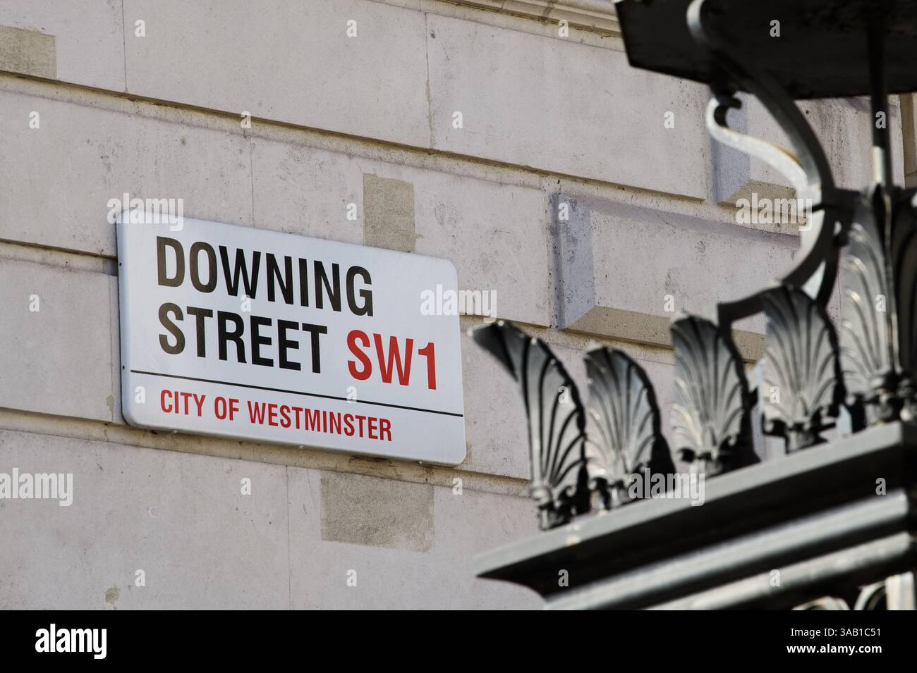 Street sign for Downing Street SW1 City of Westminster on a wall at Downing Street London with ...