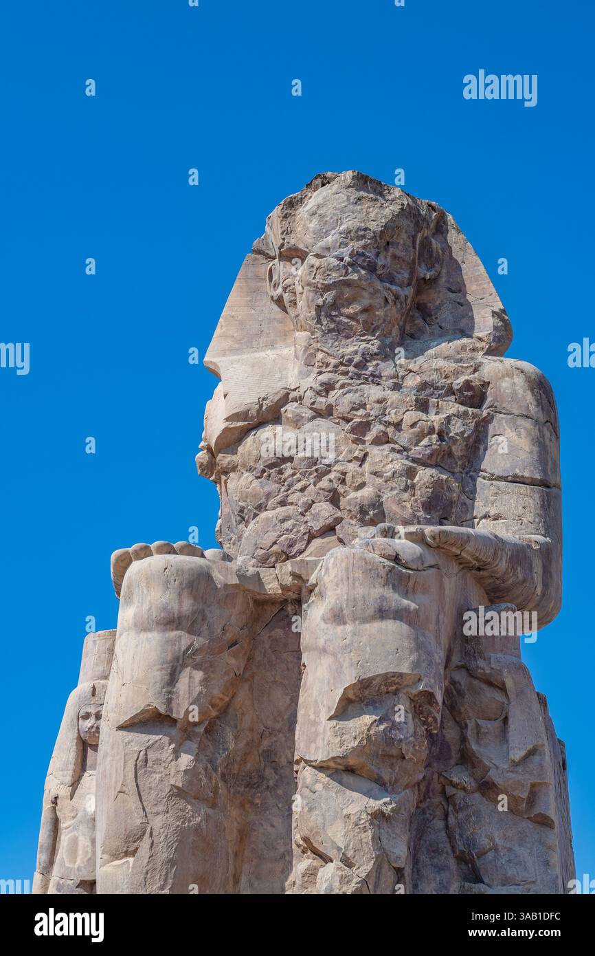The Colossus of Memnon, one of two massive stone statues of the Pharaoh ...