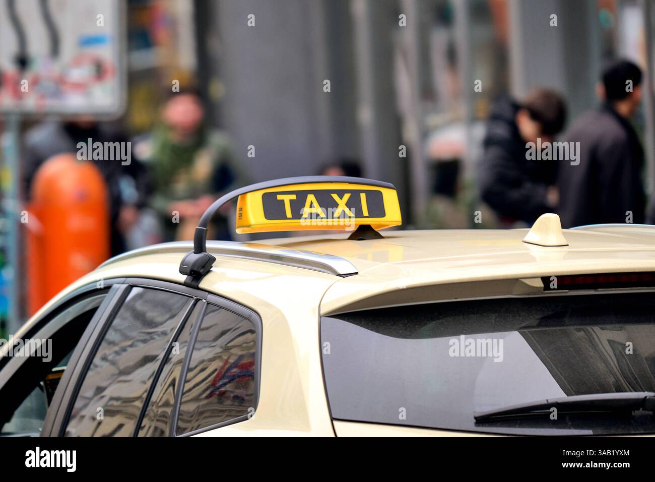 Berlin, Germany - March 27, 2025: Taxi in Berlin, classic yellow roof ...