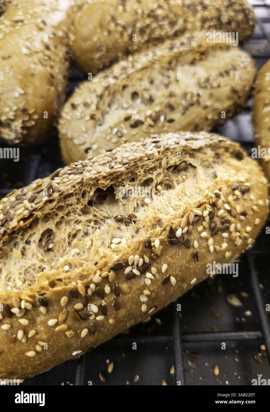 Artisanal whole grain seed bread in bakery, food and food Stock Photo ...