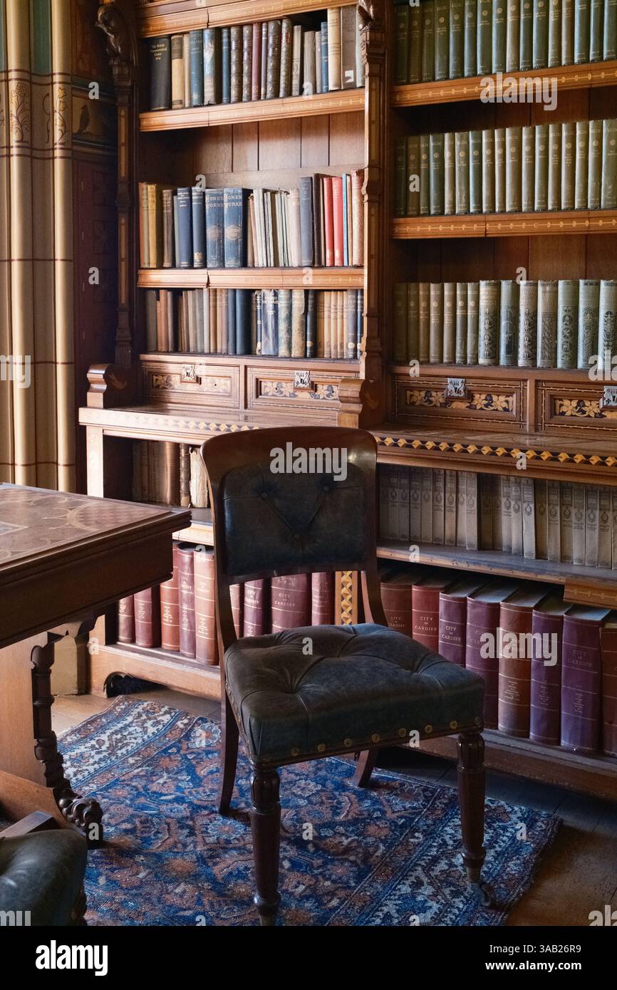 Desk, chair and bookshelves in Cardiff Library, South Wales Stock Photo ...