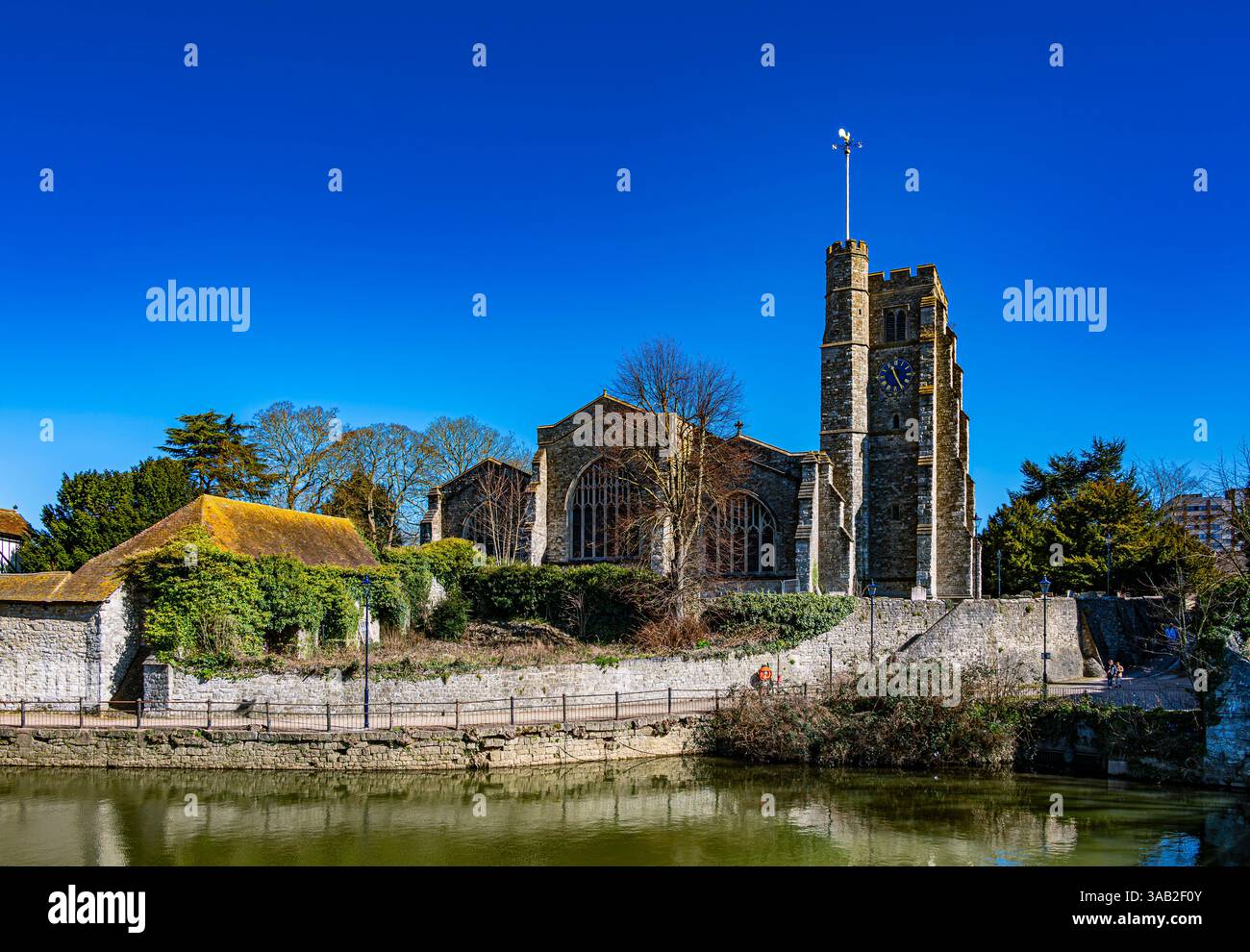 All Saints' Church in Maidstone as seen from the Riverwalk in blue sky ...
