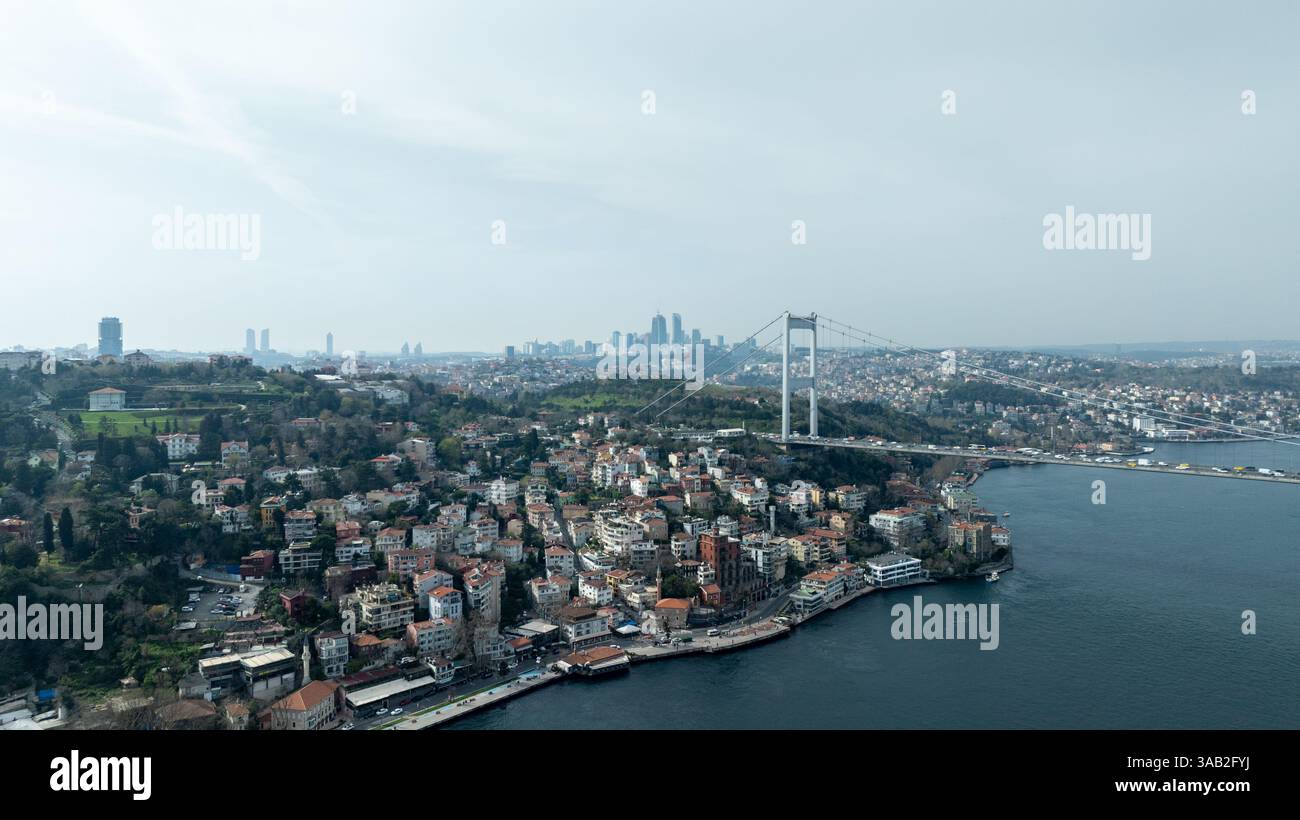 Tanker ship passing under the FSM Bridge with a heavy car traffic on ...
