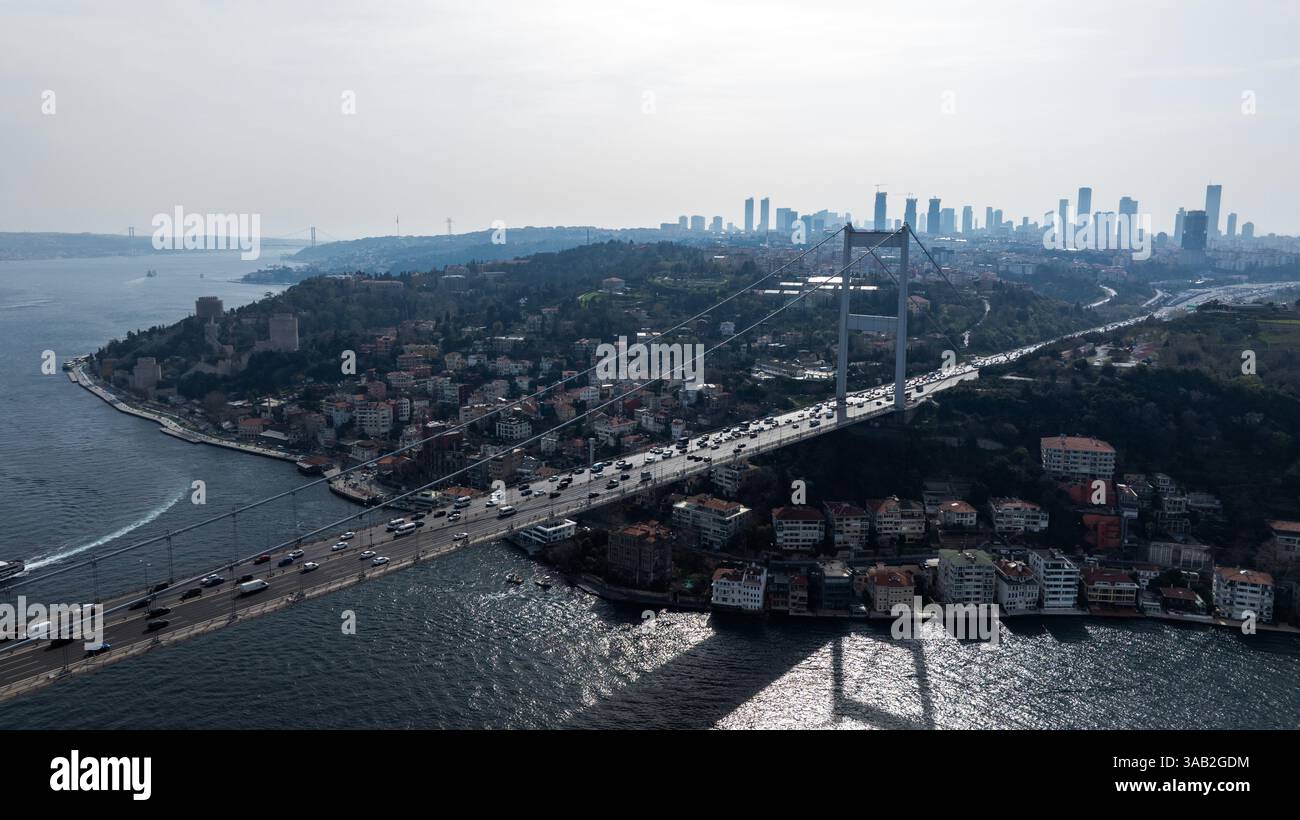 Tanker ship passing under the FSM Bridge with a heavy car traffic on ...