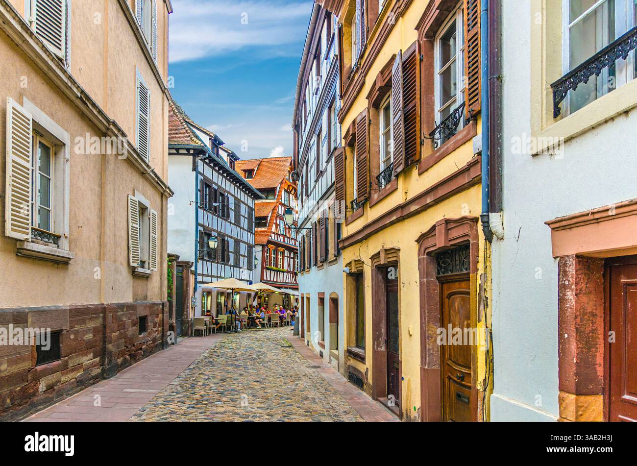 Narrow pedestrian street with old houses, fachwerk style medieval ...