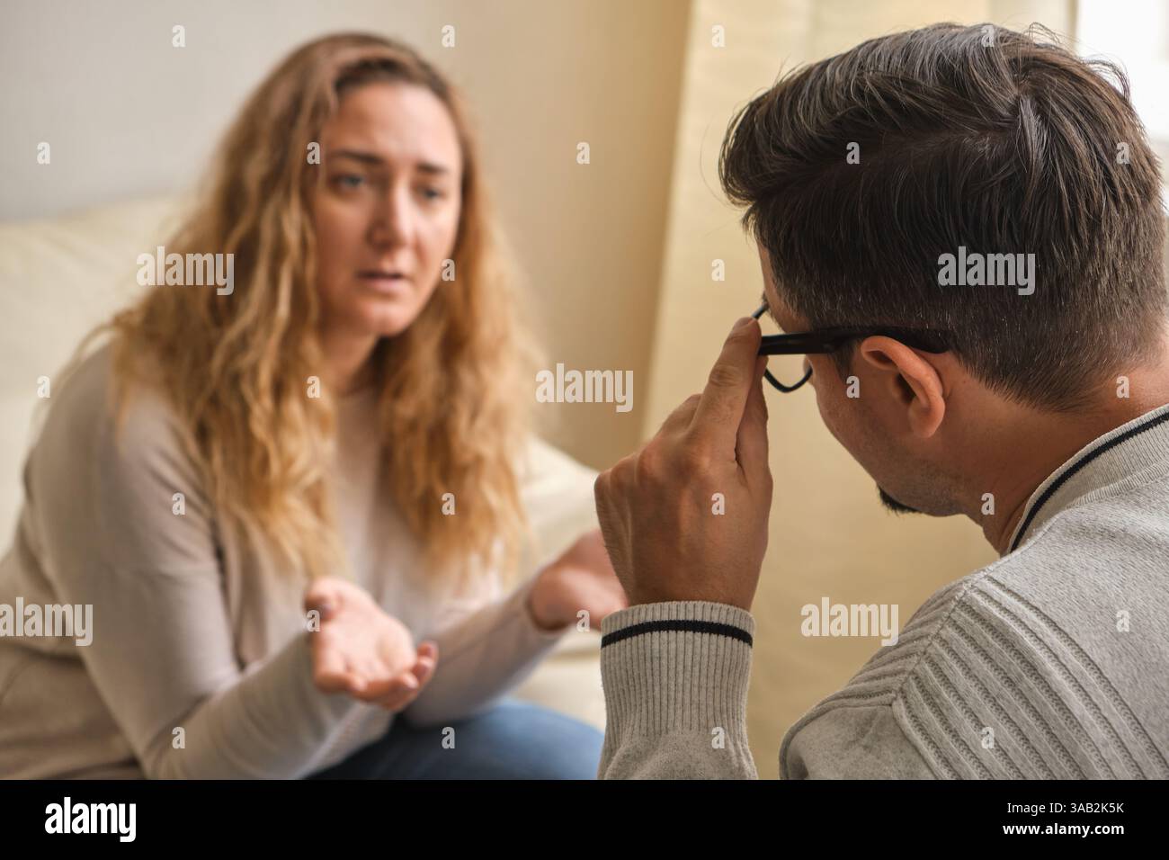 Sad Woman with psychologist close up portait, therapy, social problems ...