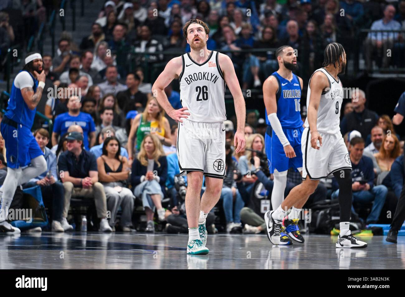 Brooklyn Nets forward Drew Timme looks at the video screen during an ...