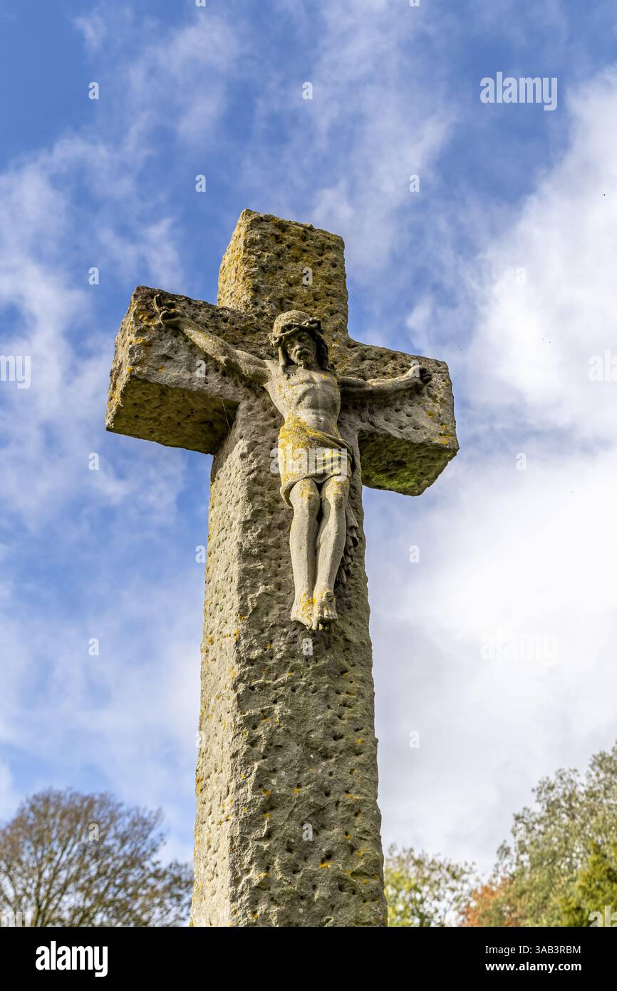 Stone Cross with Jesus Christ On It Stock Photo - Alamy