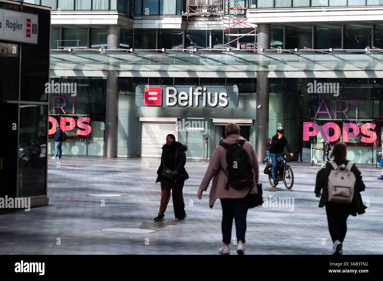 Employees and pedestrians of the Belfius Banking company going to work, Saint-Josse, Brussels ...