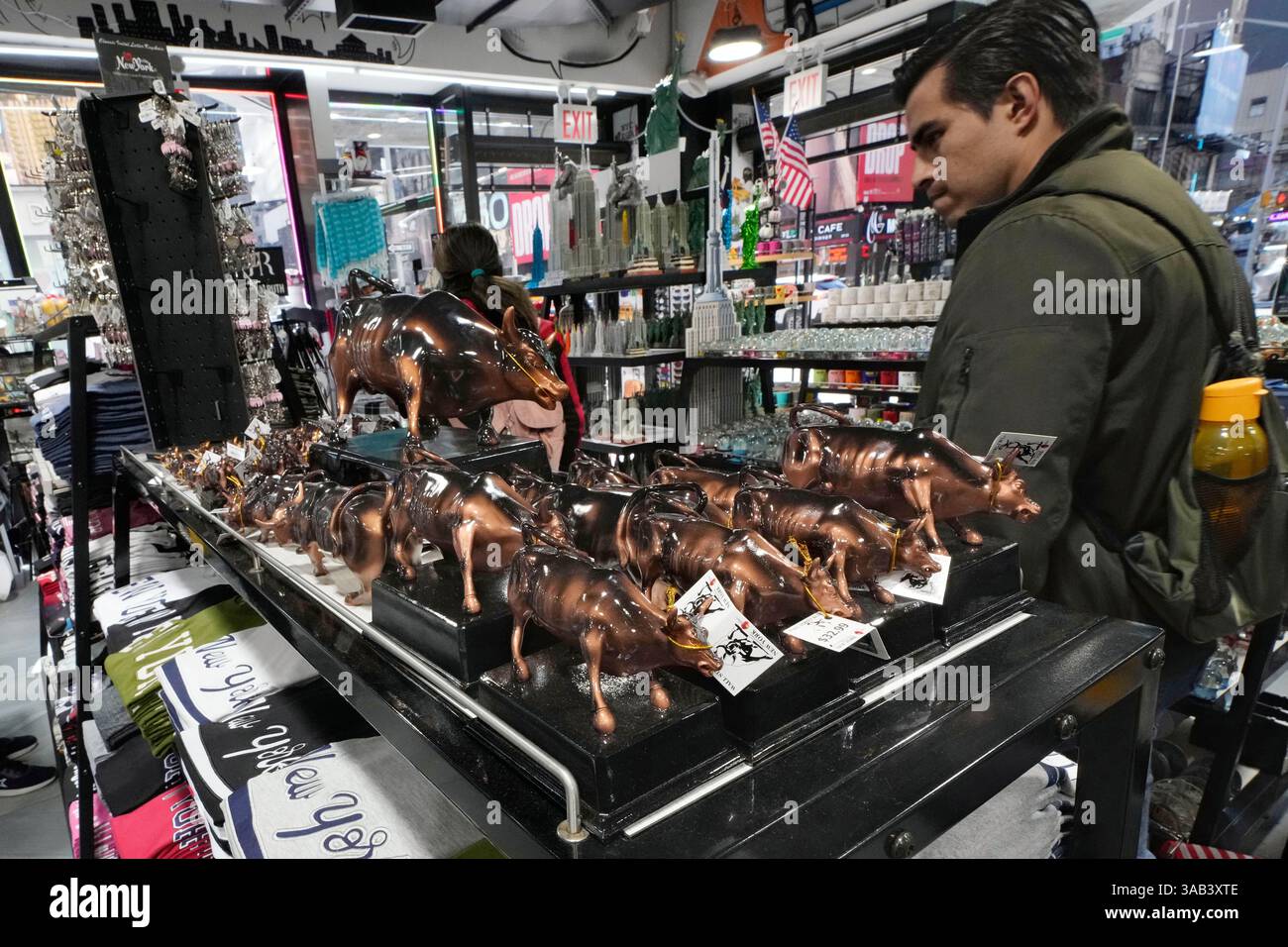 Replicas of Arturo Di Modica's "Charging Bull" sculpture are among ...