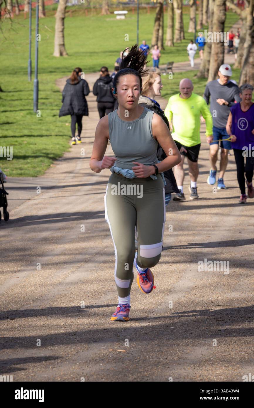 Parkrun at Gladstone Park, London Willesden NW2. An athletic young ...