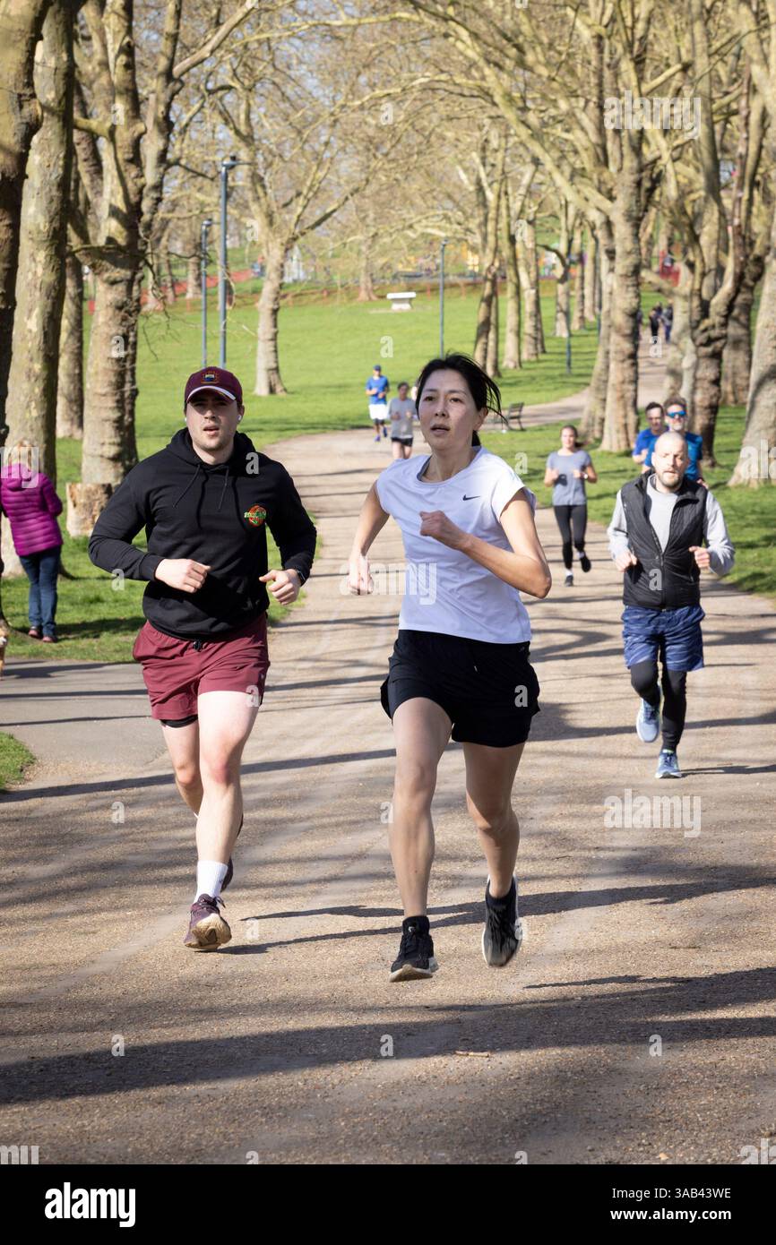 Parkrun at Gladstone Park, London Willesden NW2. An athletic young ...