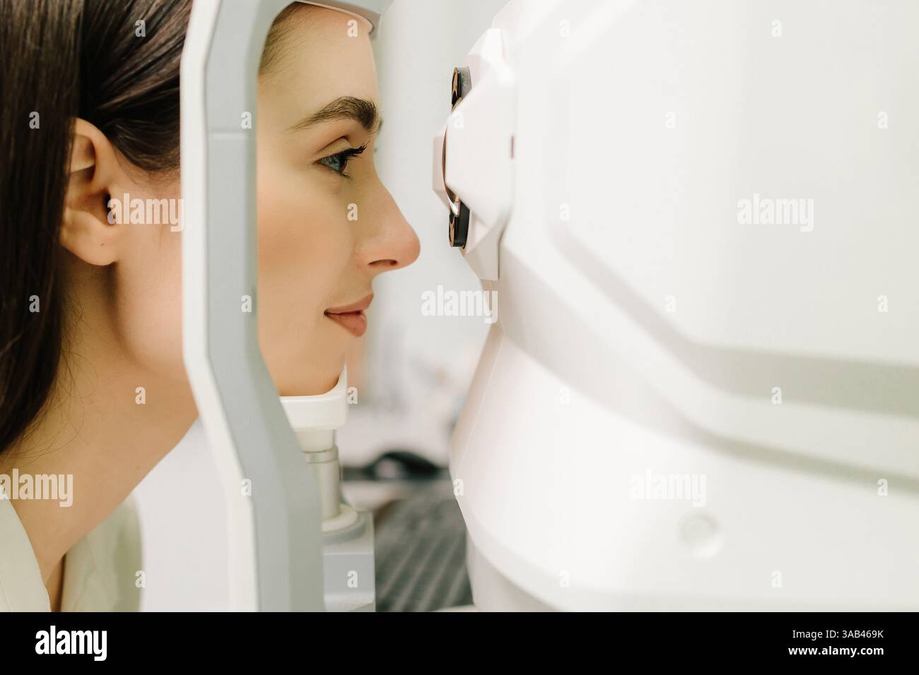 Examination of eyes of patient using optical coherence tomograph ...