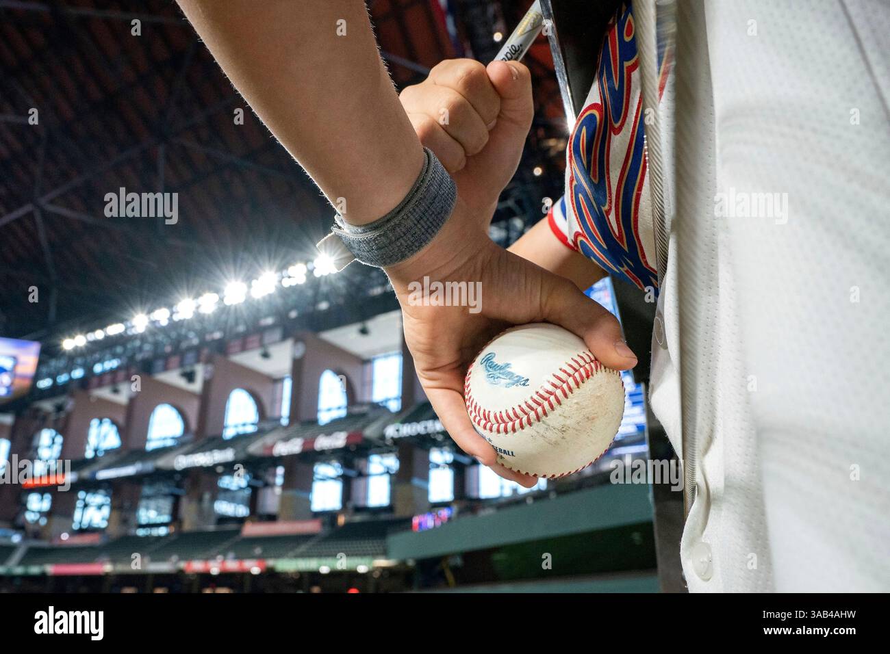 Brayden Bowman, 10, waits for an opportunity to get an autograph before ...