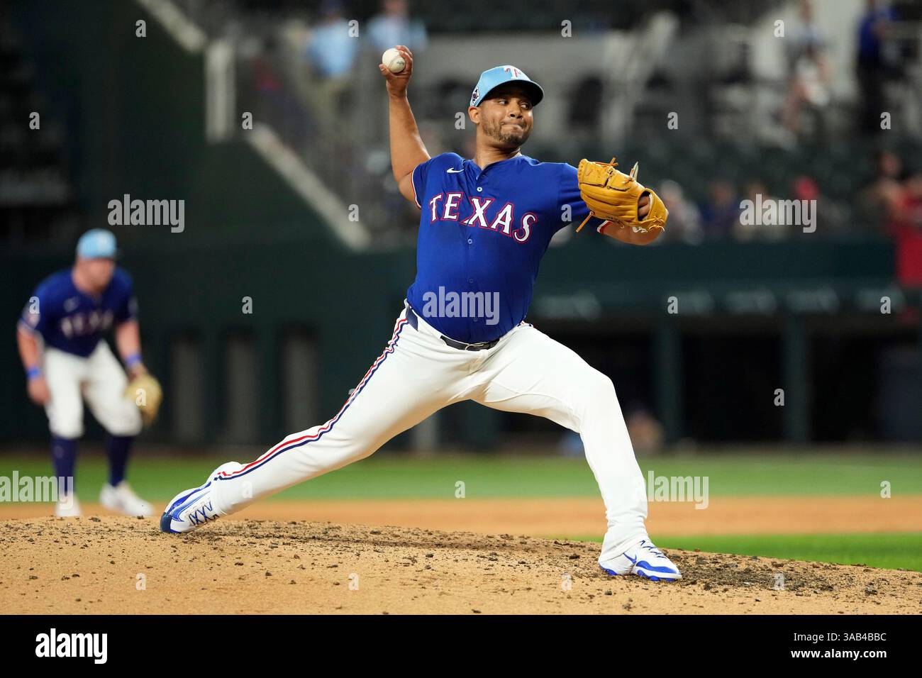 Texas Rangers relief pitcher Gerson Garabito throws against the Kansas City Royals during a ...