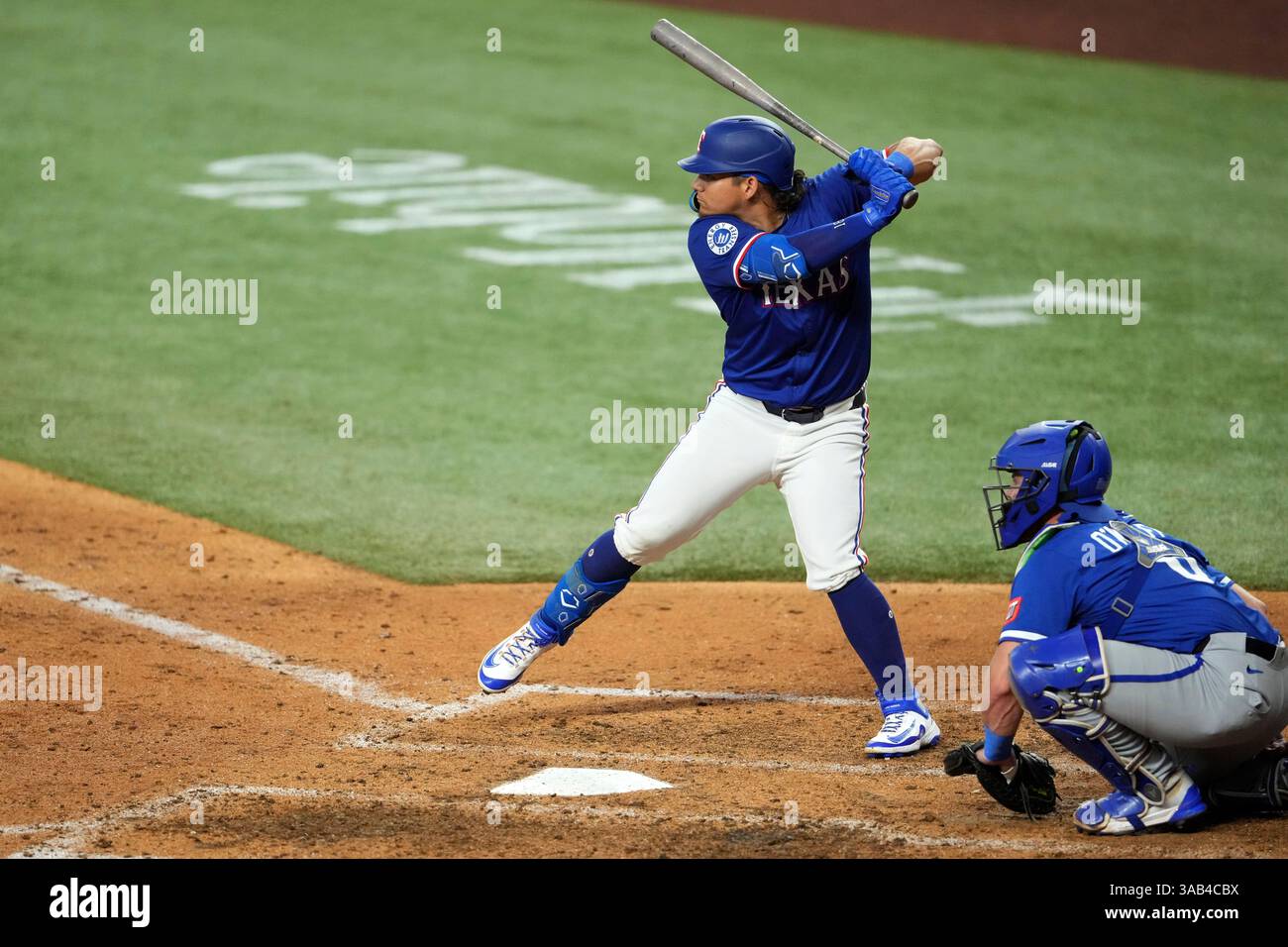 Texas Rangers' Alejandro Osuna prepares to swing during a spring ...