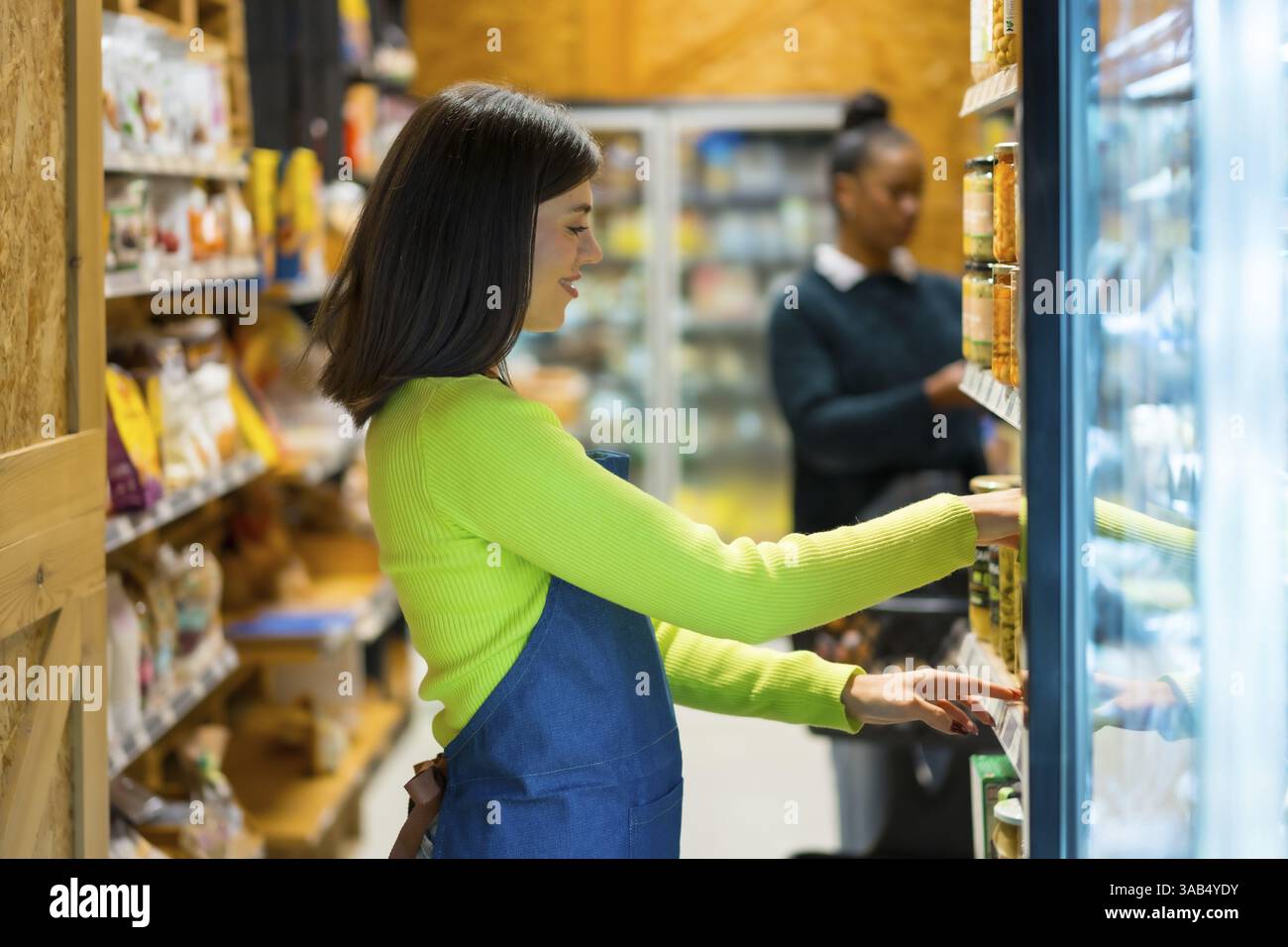 Female workers advertising healthy food hi-res stock photography and images - Alamy