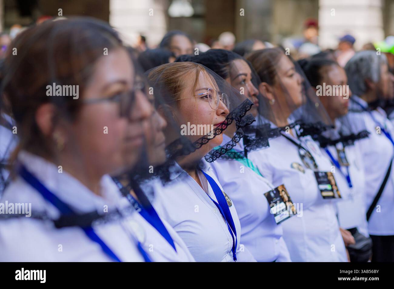 Women walk with devotion in the Good Friday procession in Puebla ...