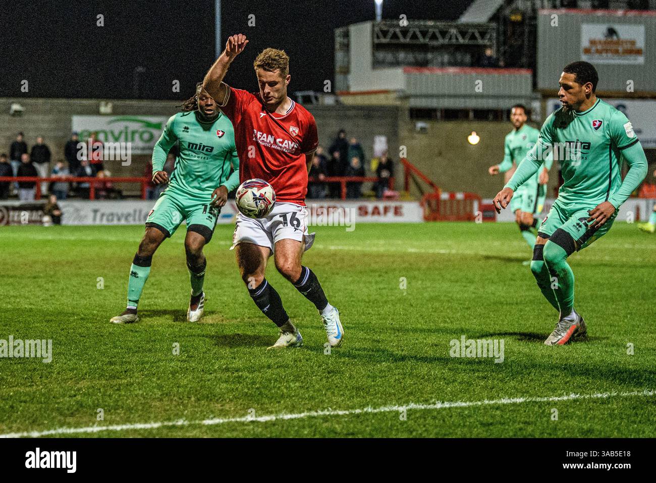 Morecambe on Tuesday 1st April 2025. Morecambe FC's Andrew Dallas tries ...