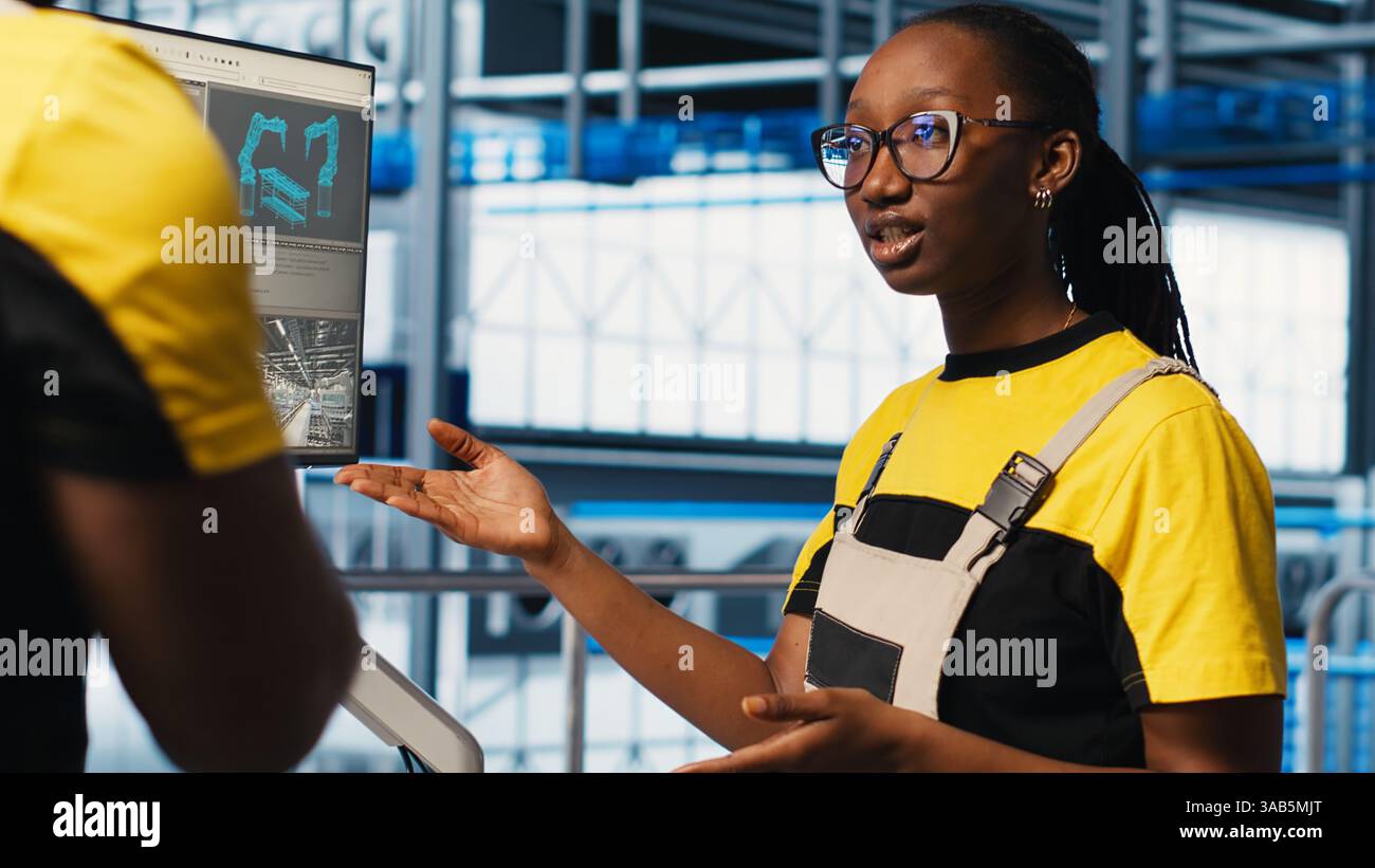 Engineering team in industry 4.0 industrial plant cooperating to ...