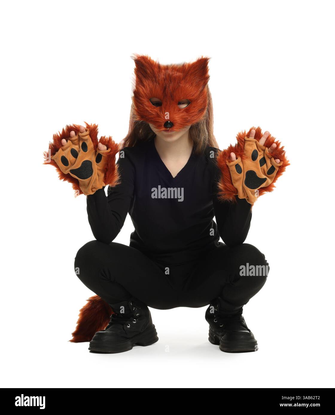 Quadrobics. Girl wearing fox mask, tail and gloves on white background ...