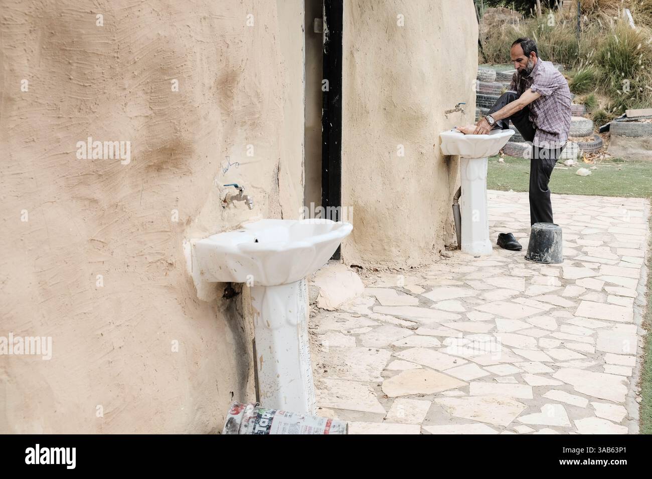 June 12, 2018 - Israel - A Muslim man washes his feet in preparation ...