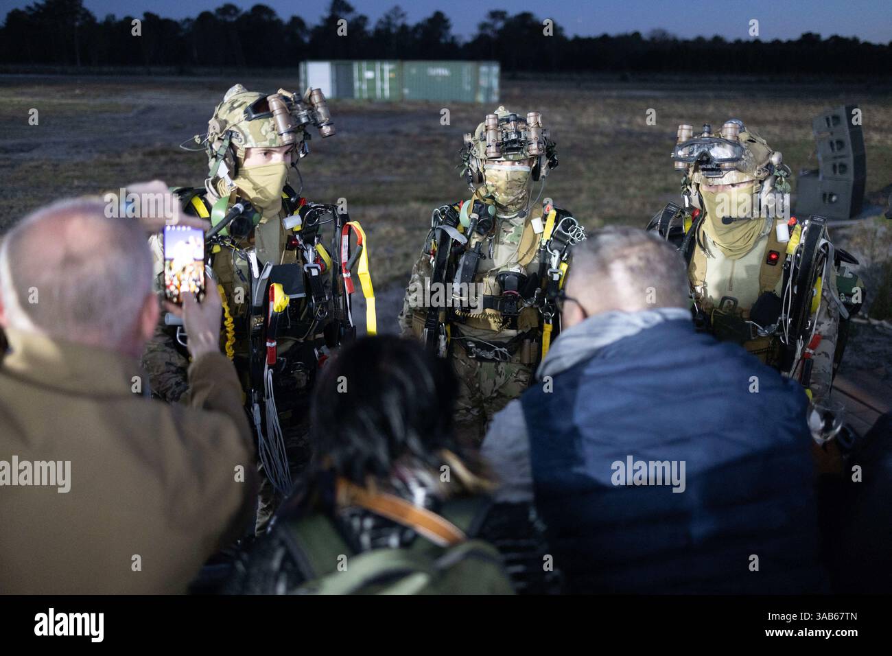 Military special forces make a parachute jump on sunset during The ...