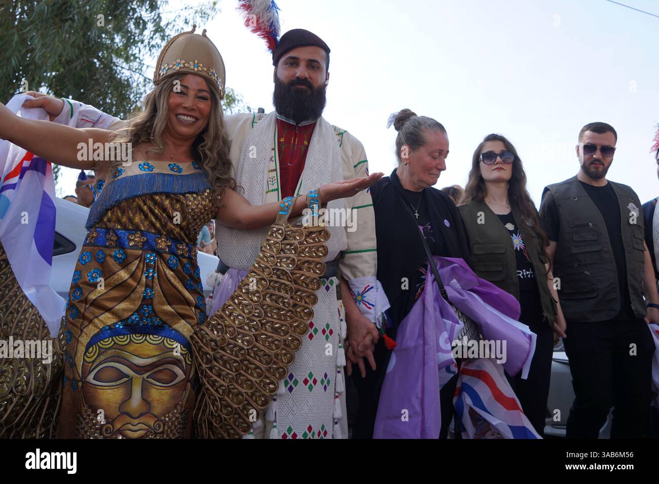 CORRECTS TO TUESDAY, NOT THURSDAY - Assyrian revellers dressed in ...
