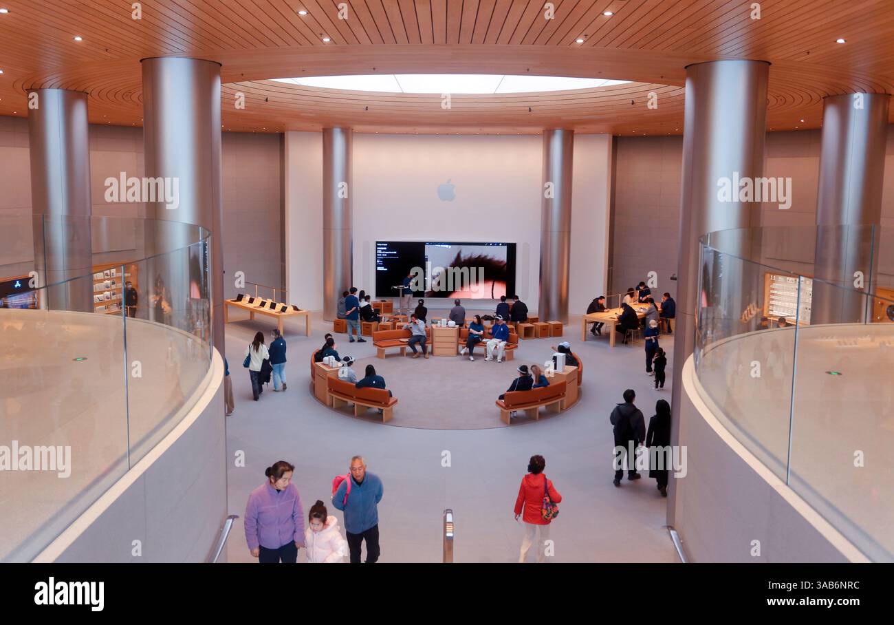 SHANGHAI, CHINA - APRIL 1, 2025 - Customers pay attention to Apple AI ...