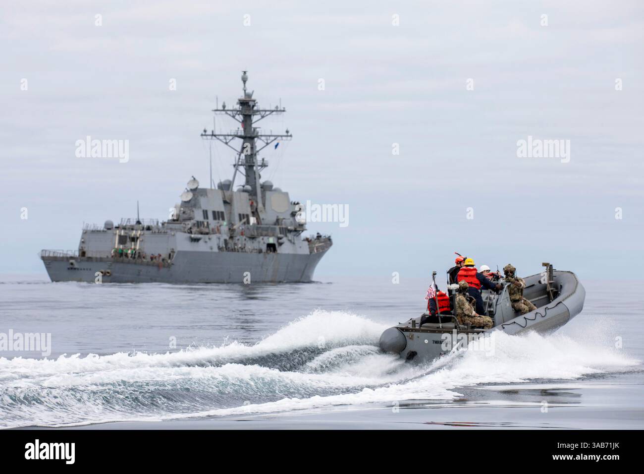 Pacific Ocean. 26th Mar, 2025. Members of a U.S. Coast Guard Law ...