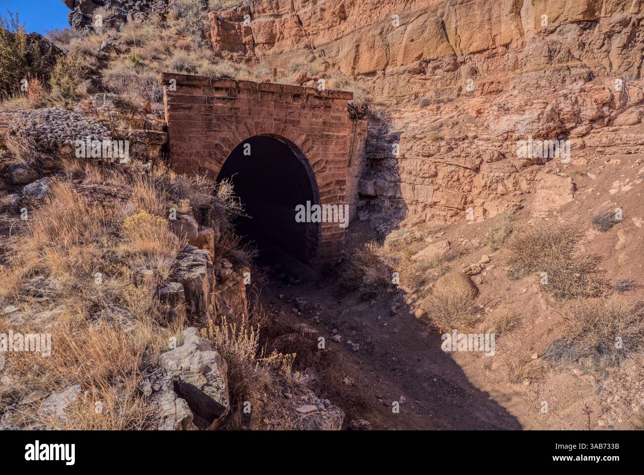 The south entrance of the historic Johnson Canyon Railroad Tunnel ...