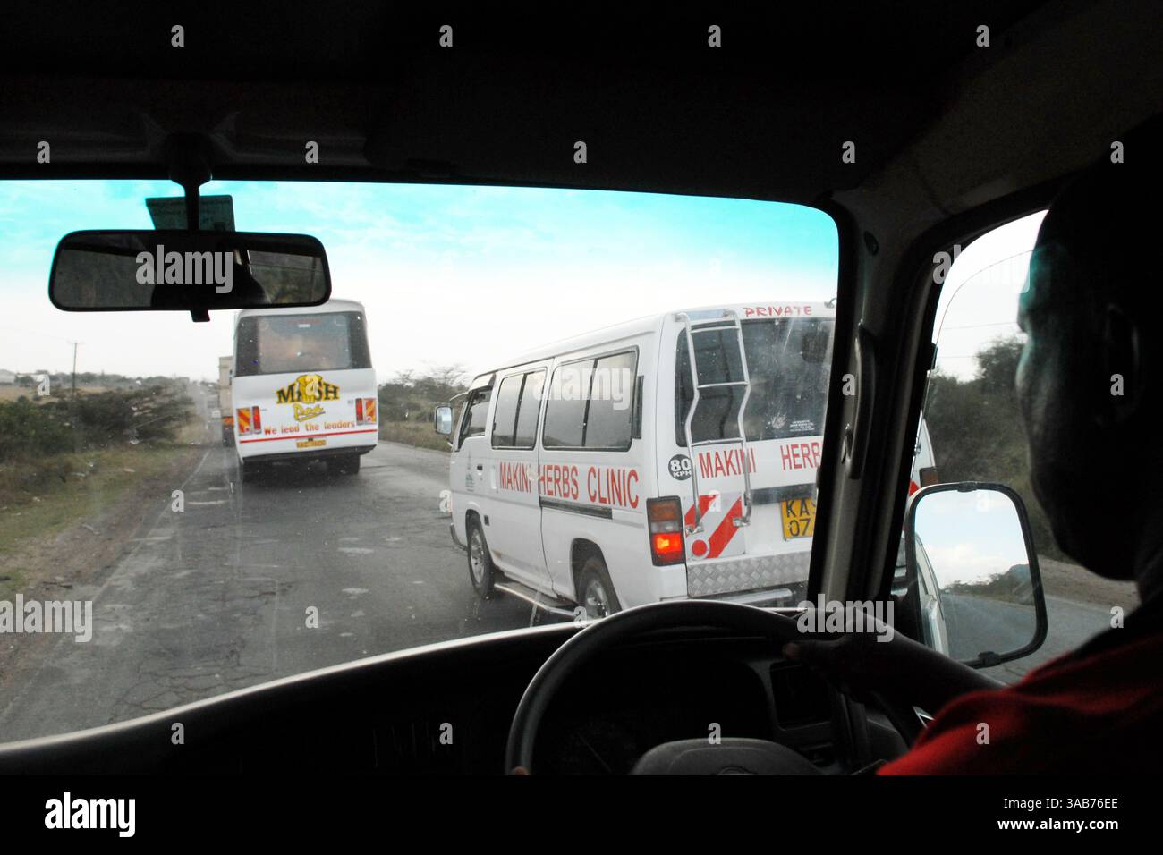Large and small vehicles fight for road space on the dangerous mud ...