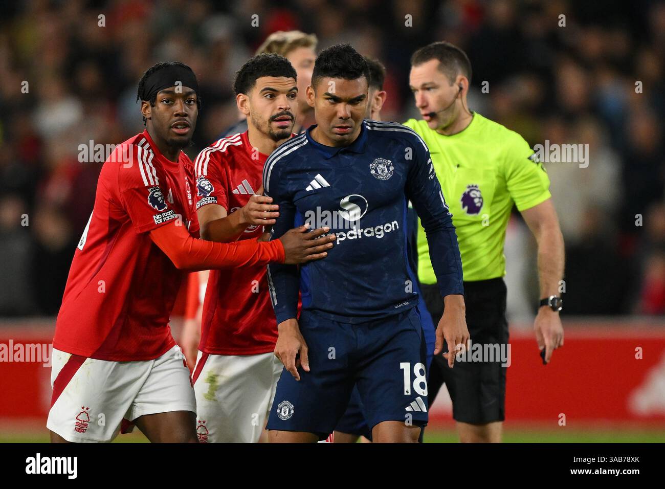 Casemiro of Manchester United reacts after being shown a yellow card by ...