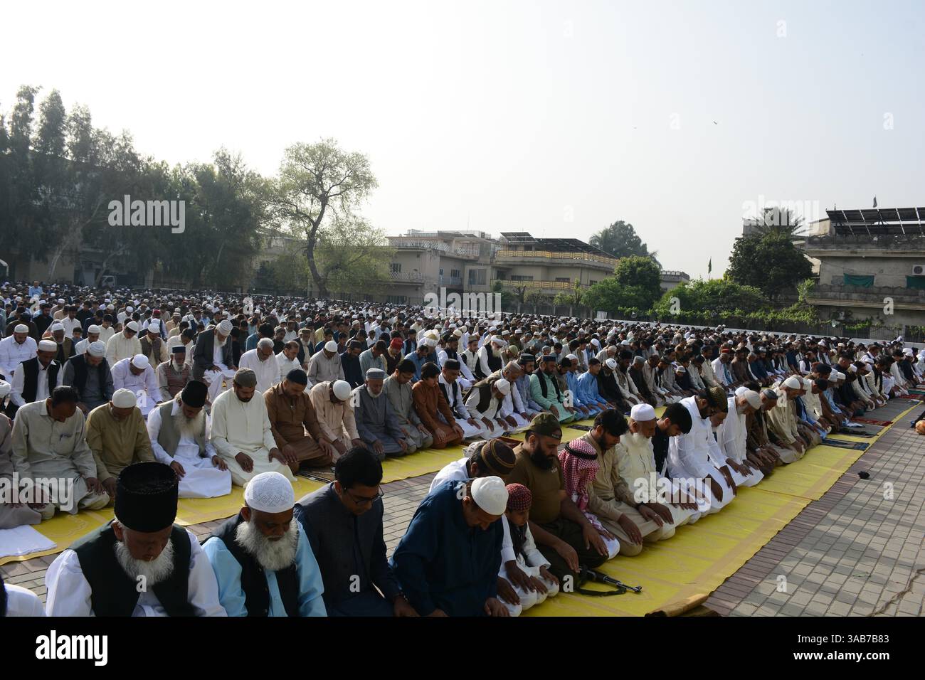 Rawalpindi, Pakistan. 31st Mar, 2025. Muslims greet each other after ...