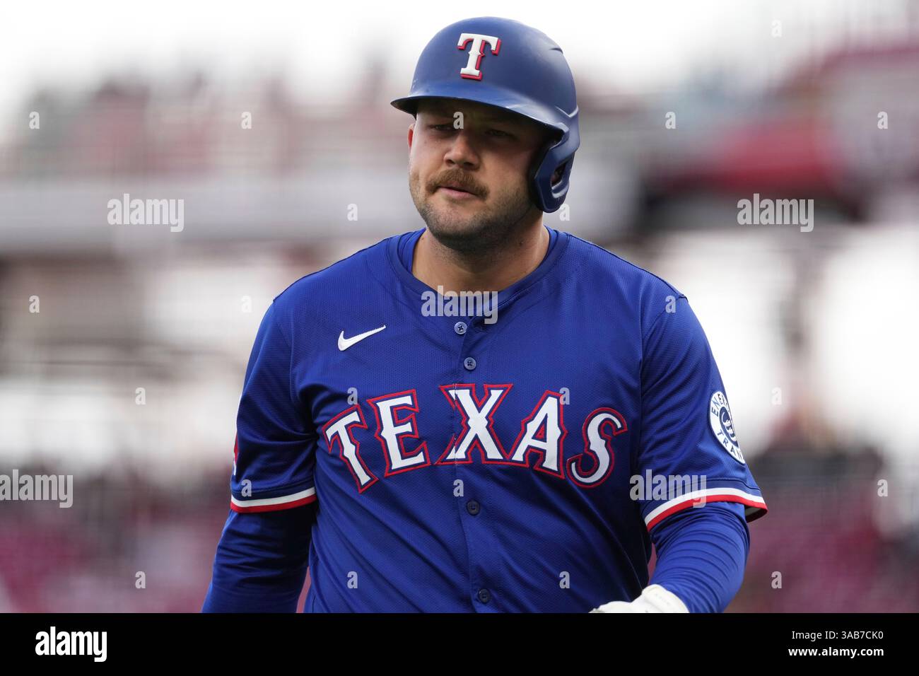 Texas Rangers' Jake Burger reacts after striking out in the second ...