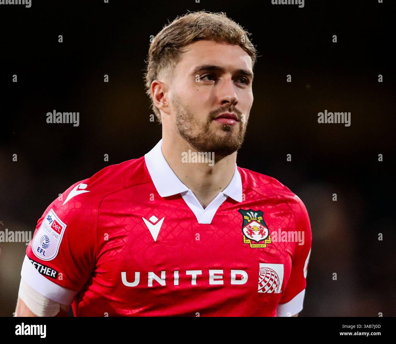 Cambridge, UK. 01st Apr, 2025. Sam Smith of Wrexham AFC lines up prior ...