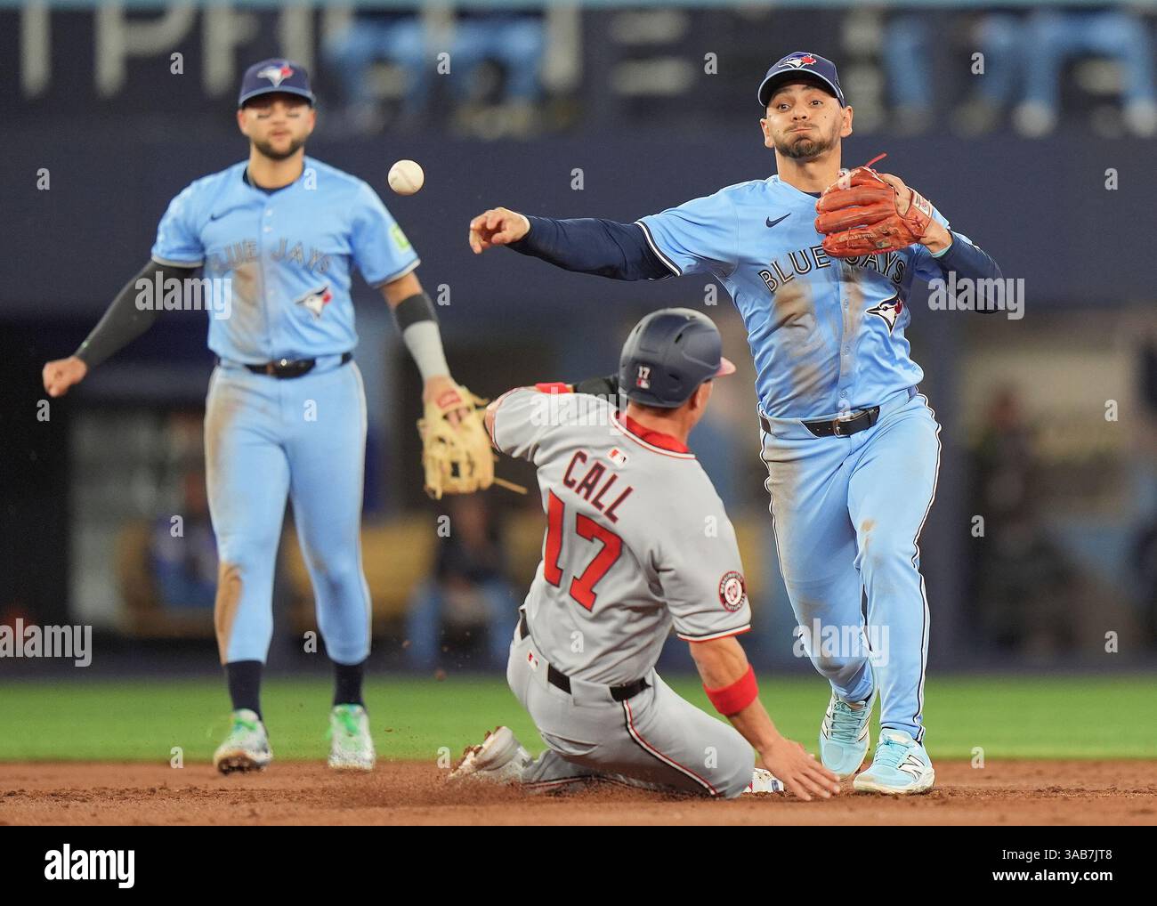 Washington Nationals' Alex Call (17) is out at second as Toronto Blue ...