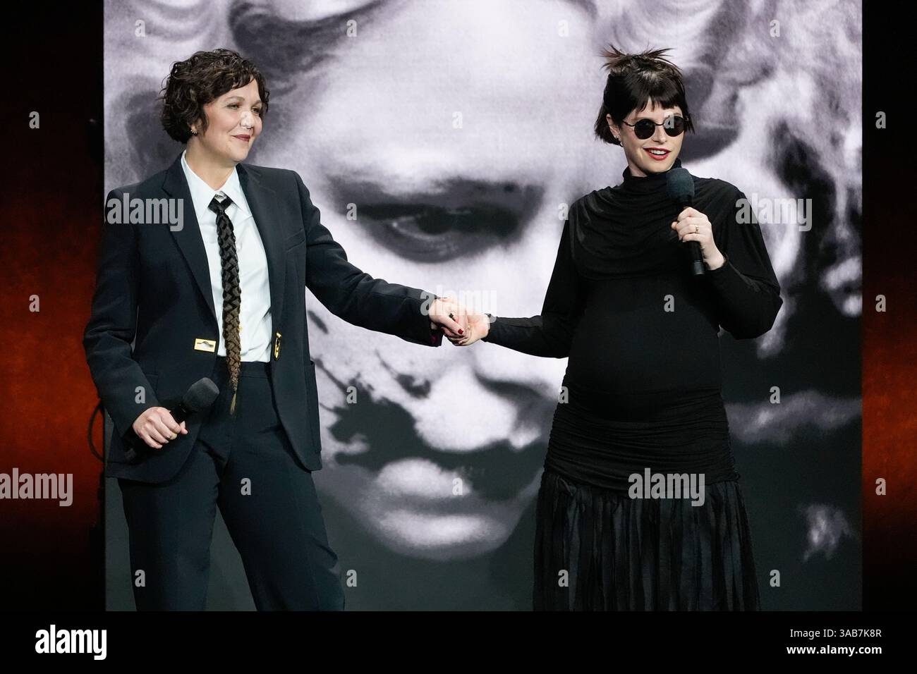 Maggie Gyllenhaal, left, director and producer of the upcoming film ...