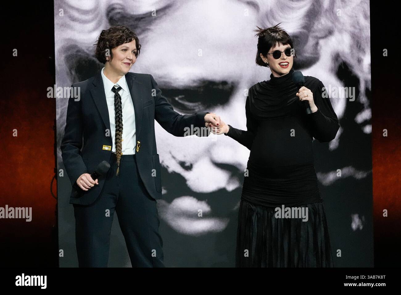 Maggie Gyllenhaal, left, director and producer of the upcoming film ...
