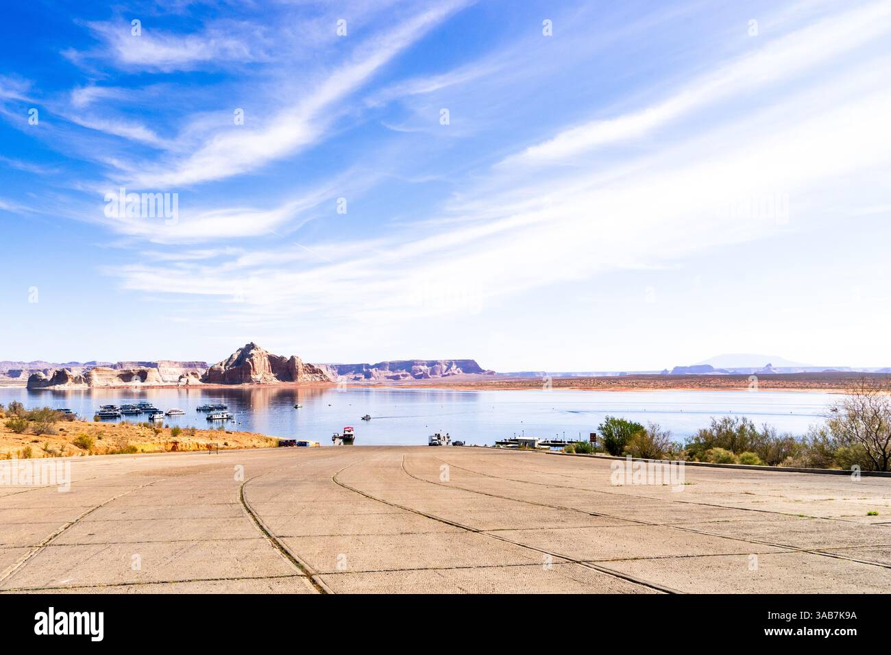 View over Wahweap Marina boat launch ramp to the Powell lake with blue ...