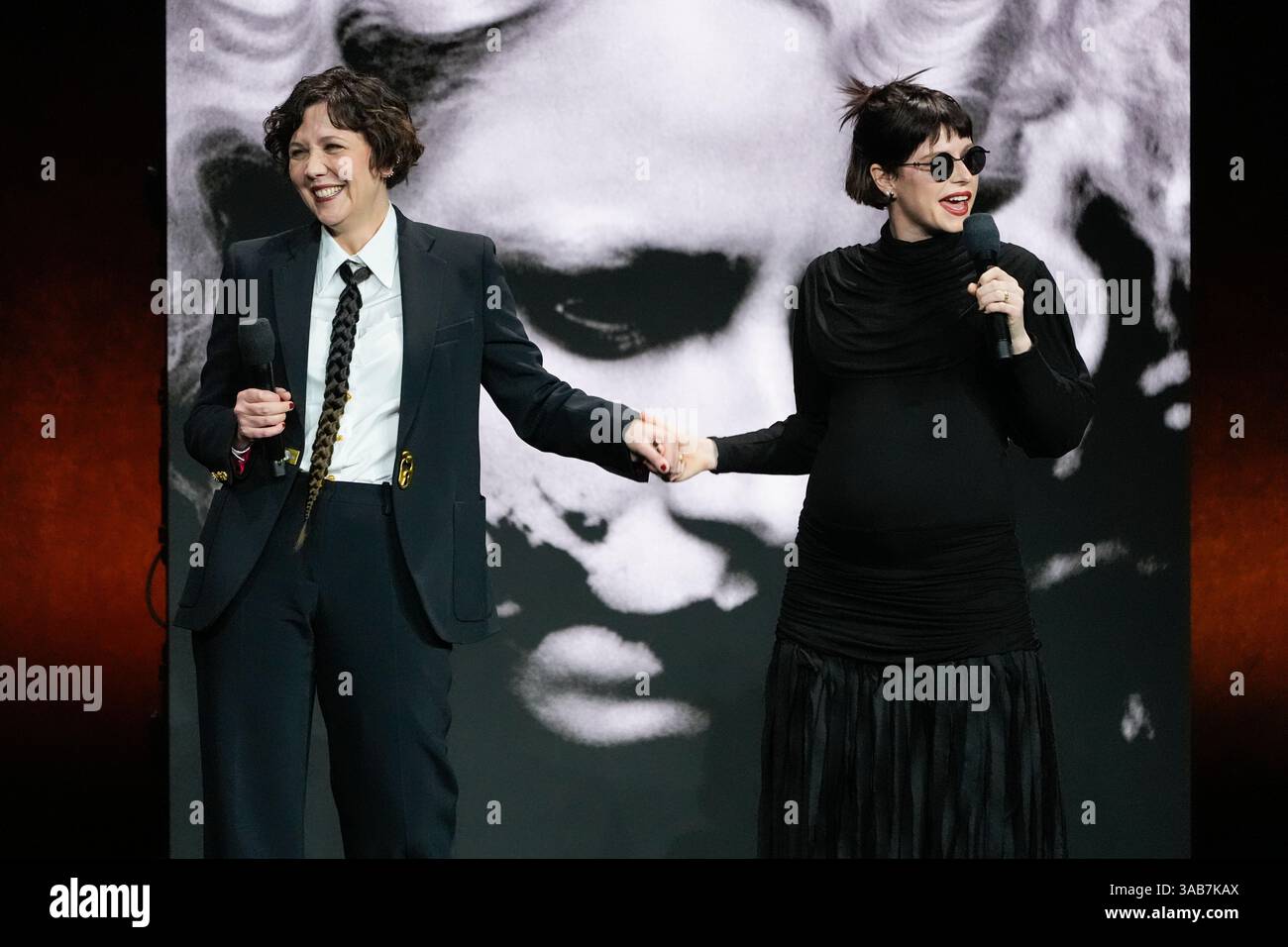 Maggie Gyllenhaal, left, director and producer of the upcoming film ...