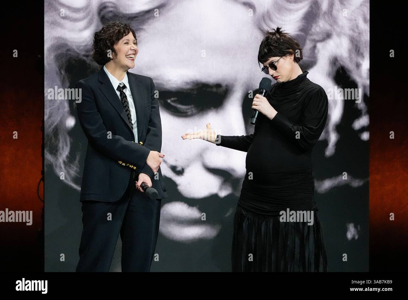 Maggie Gyllenhaal, left, director and producer of the upcoming film ...