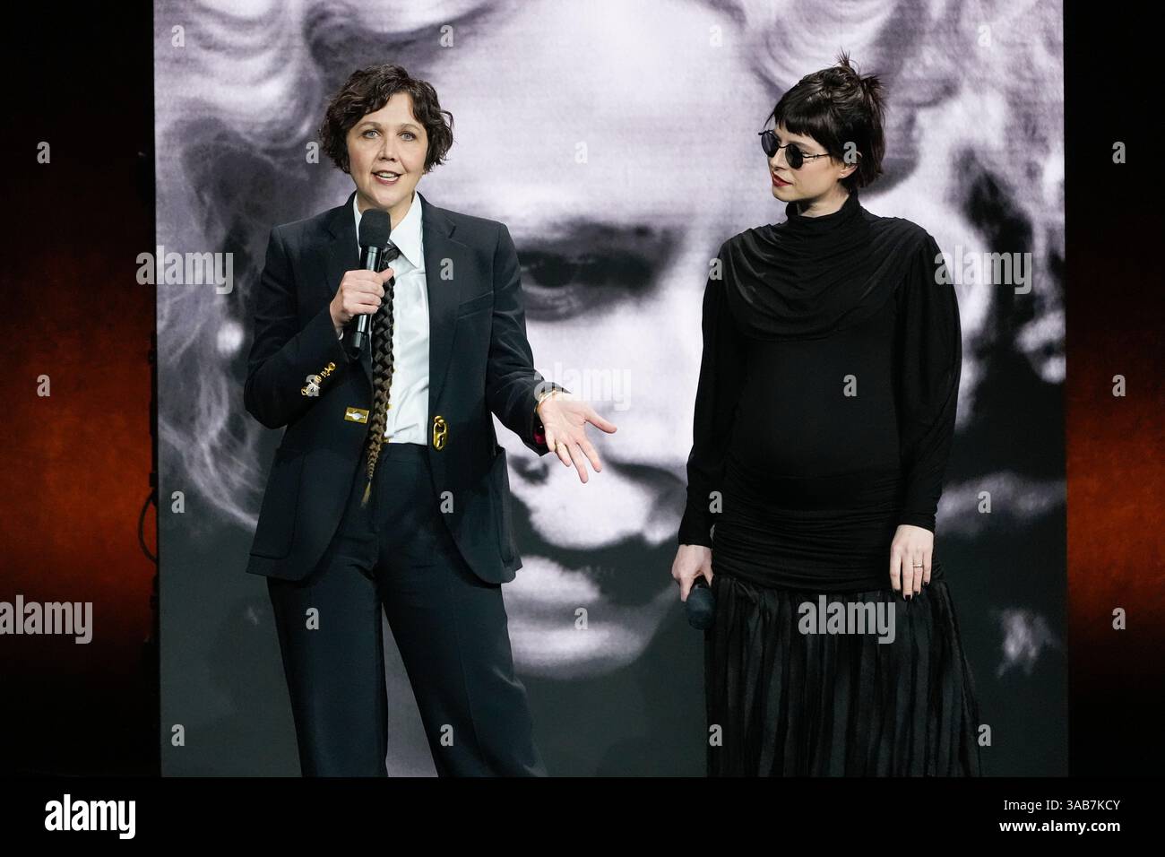 Maggie Gyllenhaal, left, director and producer of the upcoming film ...