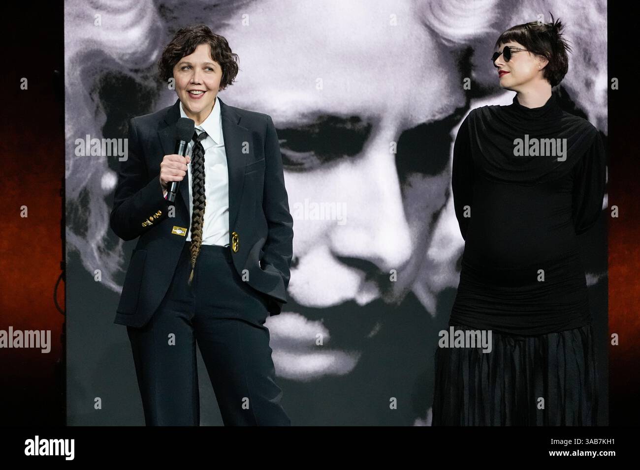 Maggie Gyllenhaal, left, director and producer of the upcoming film ...