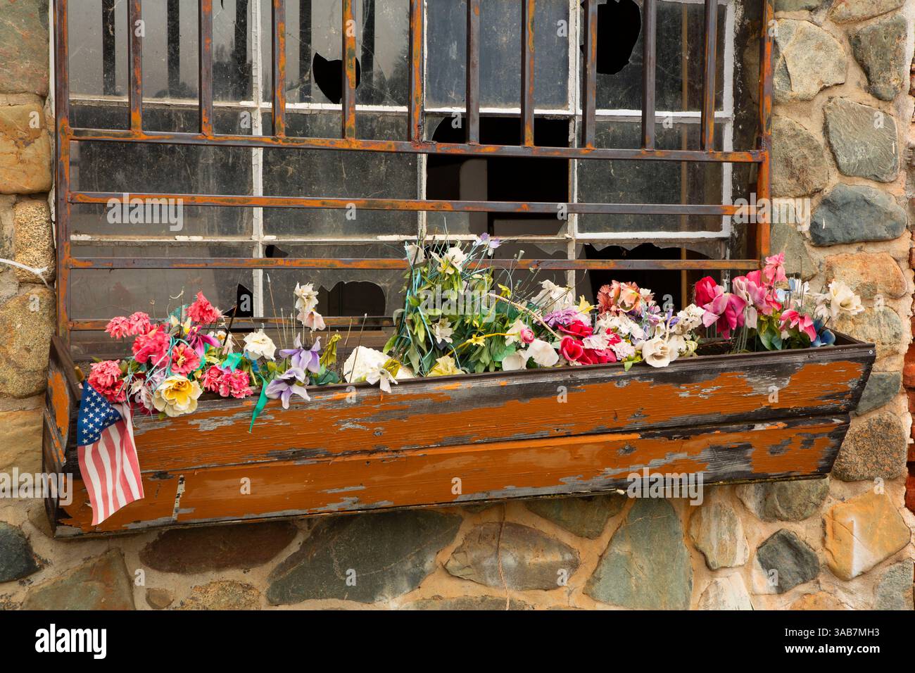 Window sill plastic flowers, Coulterville, California Stock Photo - Alamy