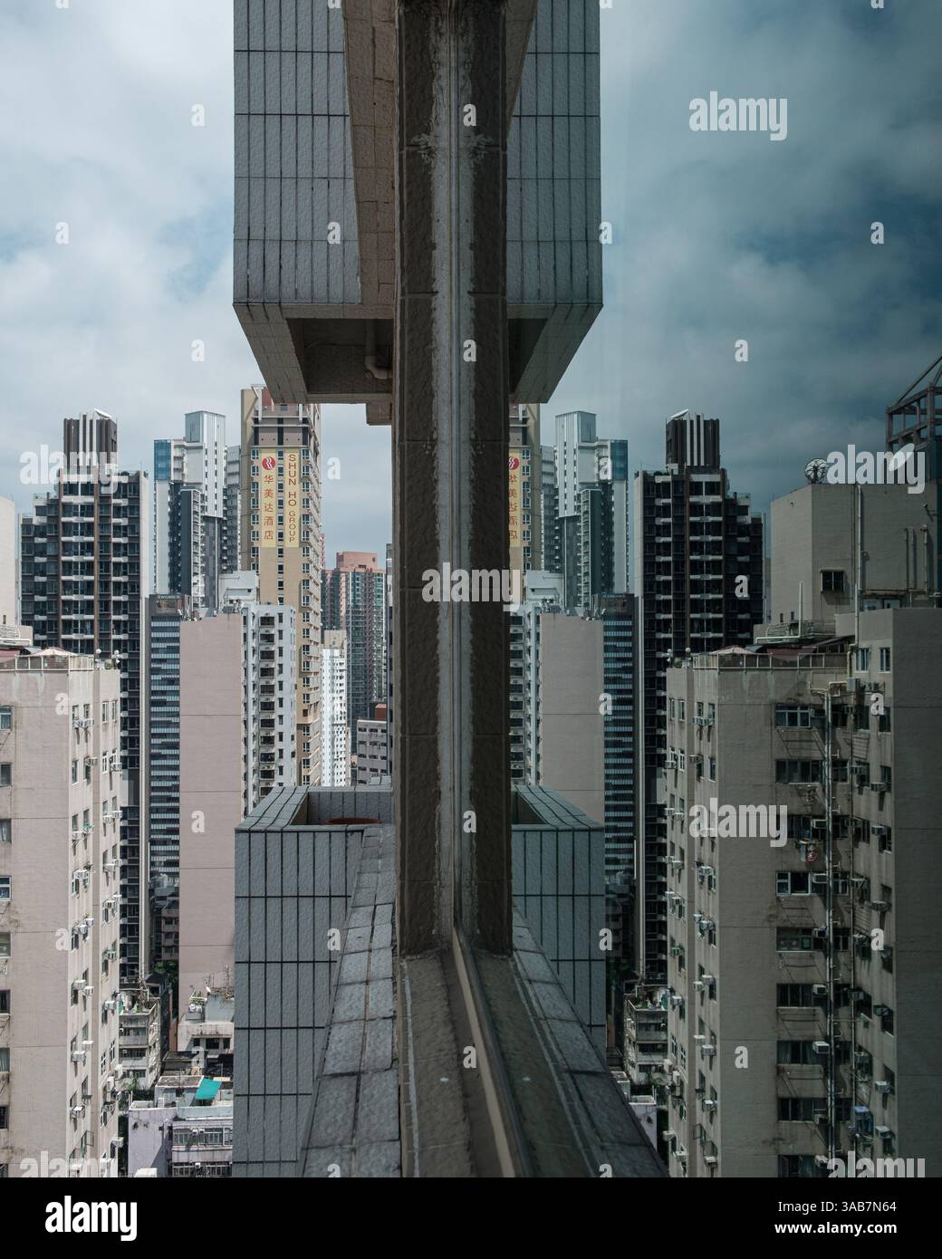 Reflections in a hotel window in Sai Ying Pun reveal Hong Kong's urban ...