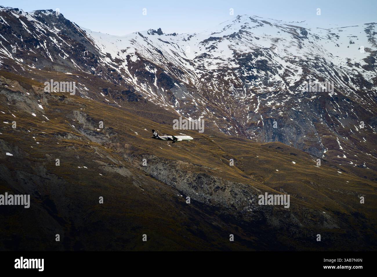 An Air New Zealand Plane landing in Queenstown Airport Stock Photo - Alamy