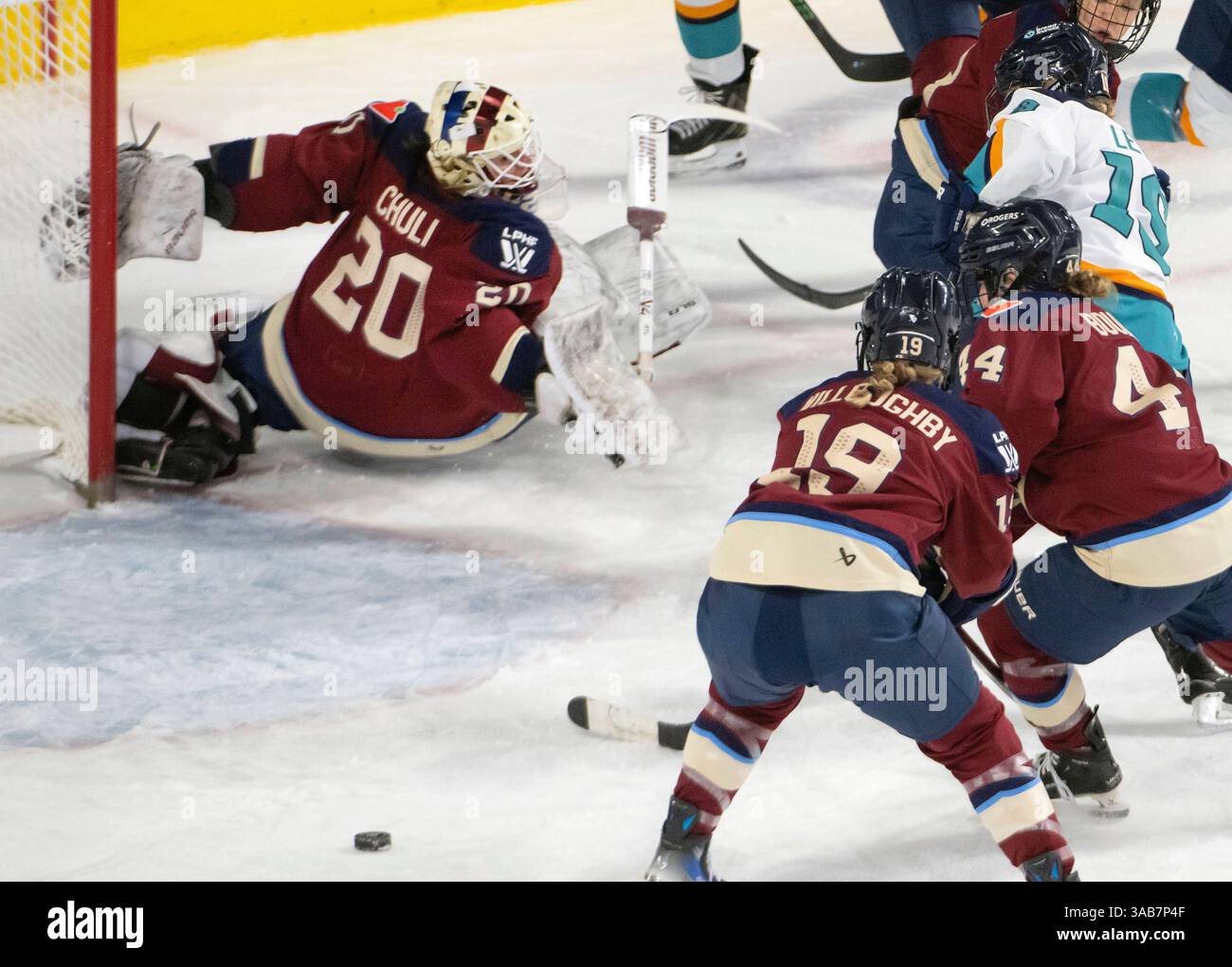Montreal Victoire goalie Elaine Chuli (20) looks back at the puck after ...
